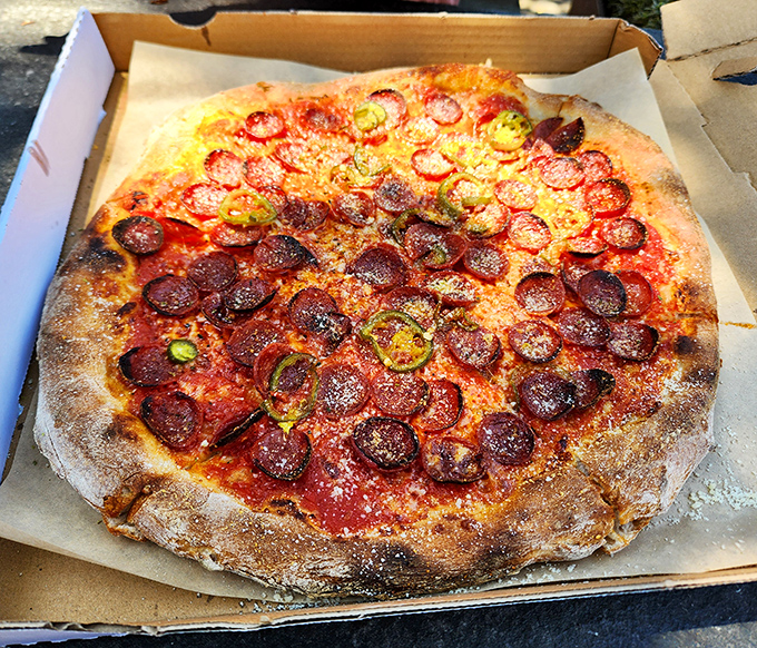 This isn't just pepperoni pizza&mdash;it's pepperoni that went to graduate school, with pickled jalape&ntilde;os providing the perfect counterargument to richness.