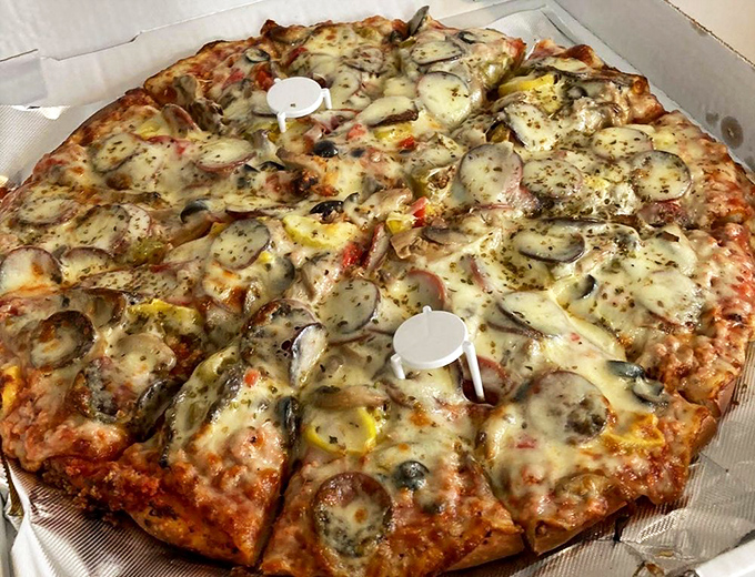 Behold "The Works" in all its glory &ndash; a pizza masterpiece that redefines what loaded really means.