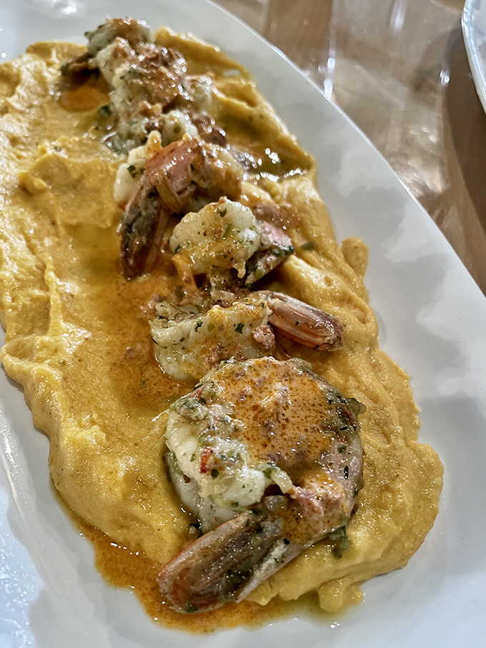 Poblano Pesto Shrimp, nestled on a golden bed of what appears to be creamy grits, doesn&rsquo;t just speak Southern comfort&mdash;it sings it with a Florida accent.