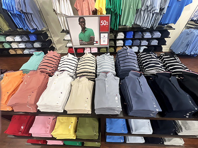 A color spectrum of polo shirts stands at attention, ready to rescue countless men from their "I have nothing to wear" complaints.