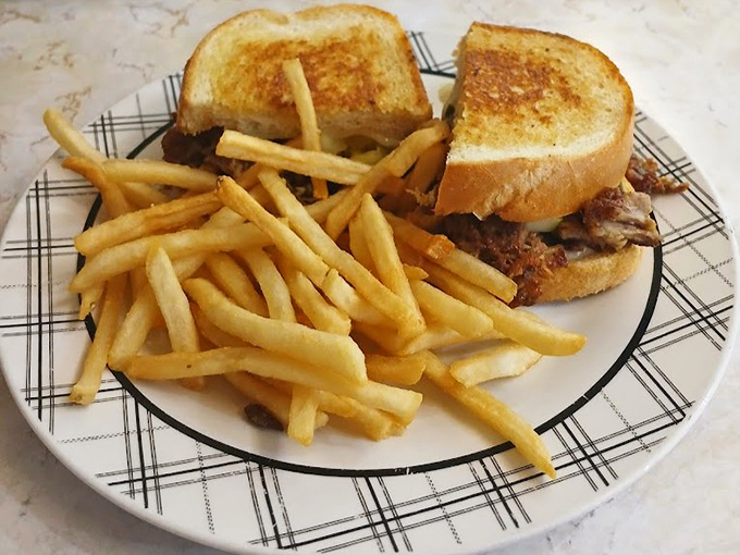 The legendary pot roast sandwich &ndash; tender beef nestled between perfectly grilled bread with fries that demand equal attention.