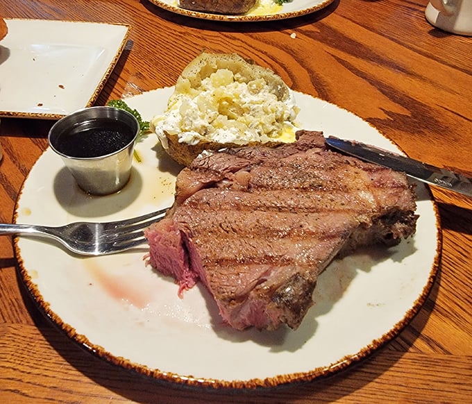 This prime rib doesn't need a filter or fancy lighting &ndash; just a sharp knife and your undivided attention. The baked potato stands by, ready for its supporting role.