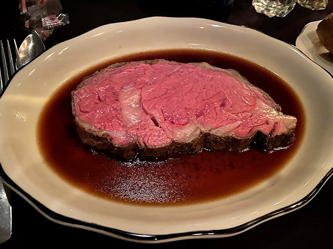 Behold the star of the show: prime rib bathing in its own juices, a perfect medium-rare masterpiece that justifies the drive from anywhere.