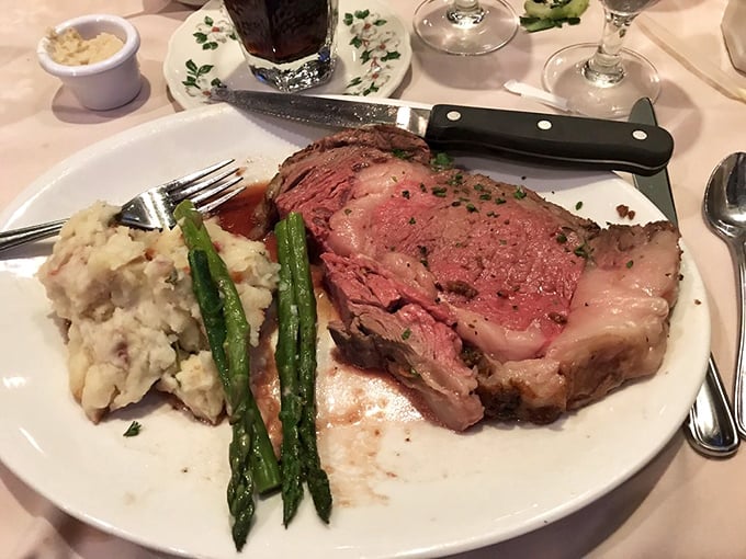 Prime rib perfection &ndash; a masterclass in meat preparation where each tender, pink-centered slice tells a story of patience and culinary expertise.