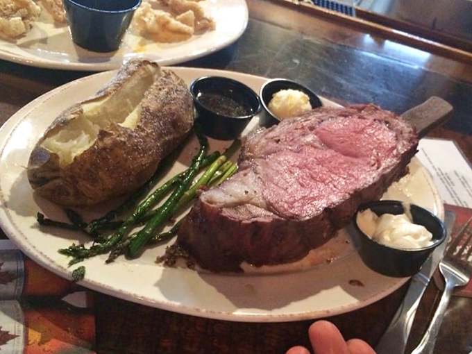 The prime rib that launched a thousand road trips. Perfectly pink, accompanied by a baked potato that could be a meal itself.