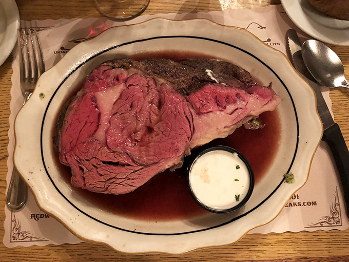 This prime rib isn't just cooked – it's been lovingly coaxed to medium-rare perfection with a side of horseradish for kick.