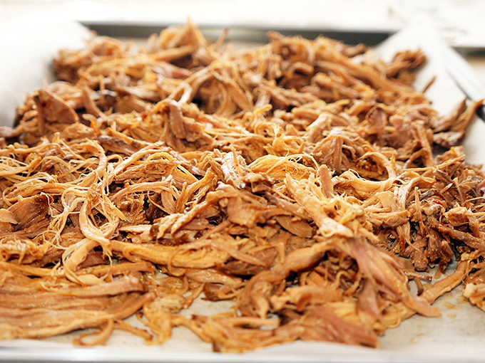 Pulled pork nirvana. These tender strands have spent hours divorcing themselves from their former structure, creating a texture that's basically meat confetti.