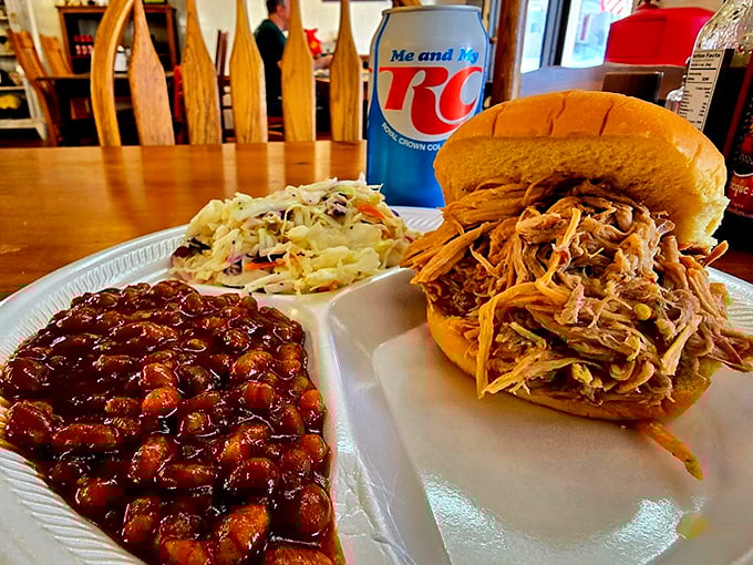 This isn't just a sandwich&mdash;it's edible architecture. Pulled pork piled high with slaw and beans that would make any Southerner nod in approval.