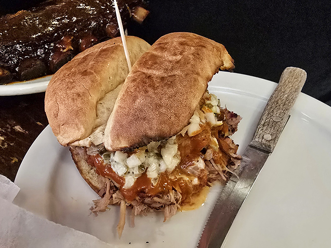 The sandwich that launched a thousand road trips. Tender pulled pork on pillowy bread with that signature sauce &ndash; resistance is futile.