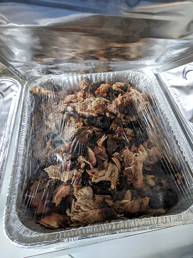 Behold the star of the show: pulled pork in its natural habitat. That bark-to-meat ratio is what BBQ aficionados dream about at night.