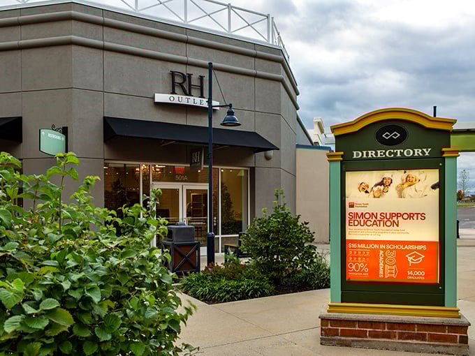 Elegance meets affordability at RH Outlet, where that sleek stone facade houses furniture dreams at pinch-me prices. The directory nearby ensures no deal goes undiscovered. 