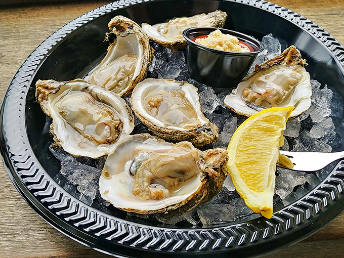 These oysters aren't just served; they're presented&mdash;glistening treasures on ice that taste like the ocean just blew you a salty kiss.