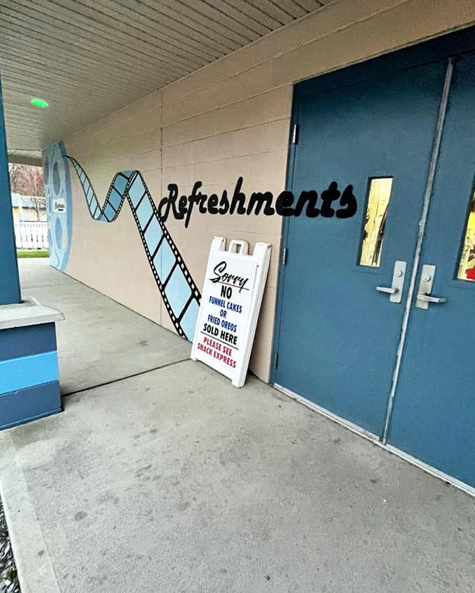 The refreshment stand beckons like a beacon of buttery popcorn goodness and childhood nostalgia rolled into one.