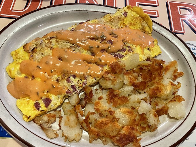 The legendary Reuben omelet in all its glory&mdash;where corned beef, sauerkraut and Swiss cheese unite under a blanket of Thousand Island dressing. Breakfast nirvana achieved.