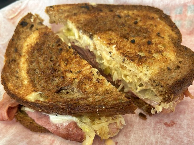 This isn't just a Reuben&mdash;it's a masterclass in sandwich architecture where corned beef, sauerkraut, and Russian dressing achieve perfect harmony.