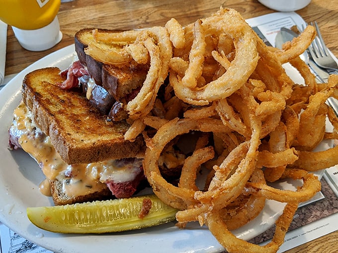 The Reuben that launched a thousand road trips. Perfectly grilled rye, melty Swiss, and a mountain of corned beef that makes the journey worthwhile. 