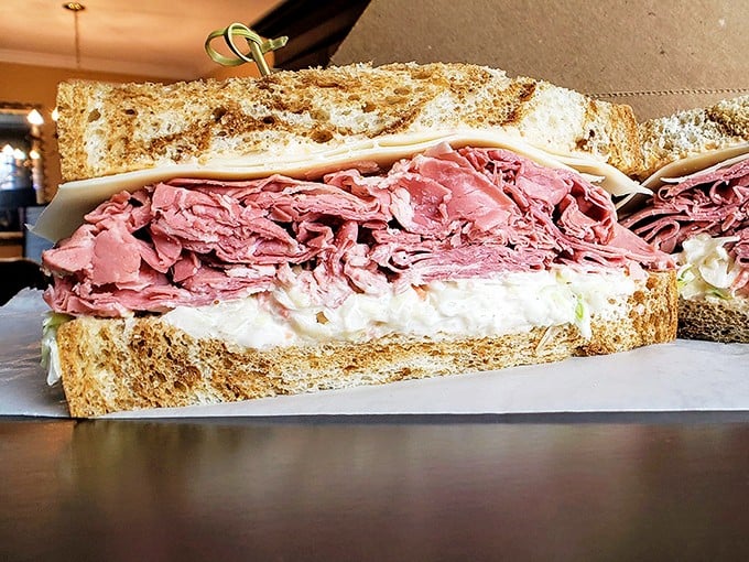 Behold the Reuben in all its glory – layers of corned beef and creamy dressing between perfectly toasted rye. This isn't lunch; it's an event.