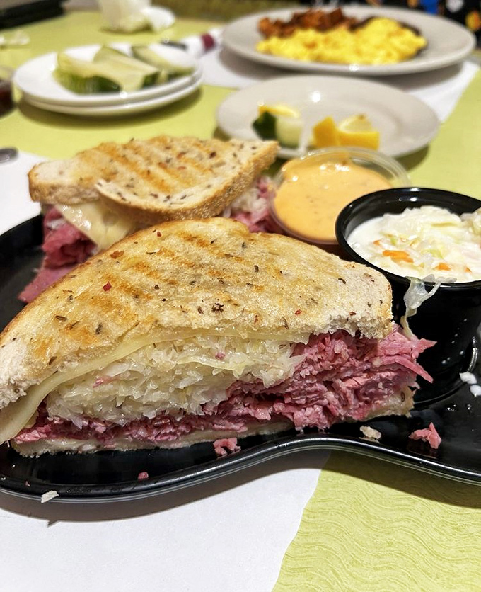 This isn't just a Reuben&mdash;it's architecture. Layers of corned beef and sauerkraut create a sandwich skyscraper that requires both hands and a strategy.