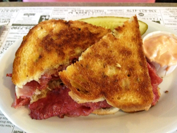 That, my friends, is what sandwich dreams are made of &ndash; a perfectly grilled Reuben with corned beef stacked high enough to make your cardiologist wince.