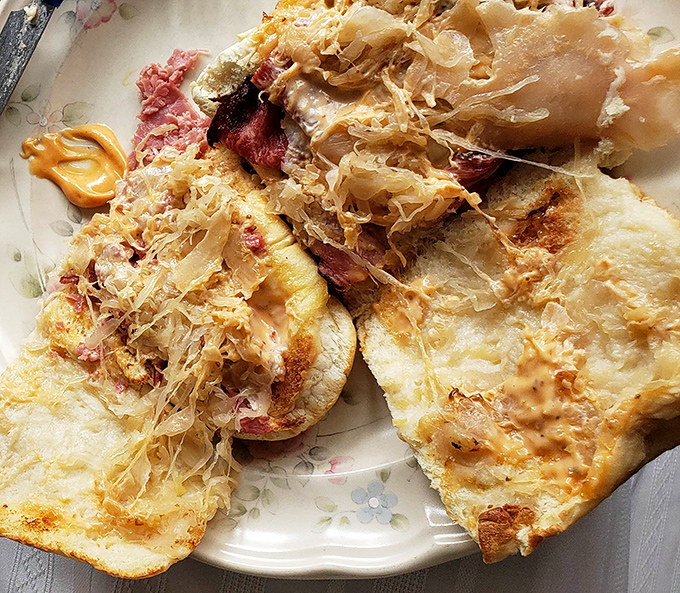 Behold the Reuben in all its glory&mdash;corned beef, sauerkraut, and Swiss cheese melting together in a symphony that makes taste buds sing.