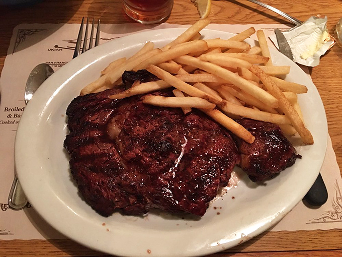 Behold the star of the show: a perfectly charred ribeye with golden fries. This isn't Instagram food&mdash;it's the real deal that makes your phone irrelevant.