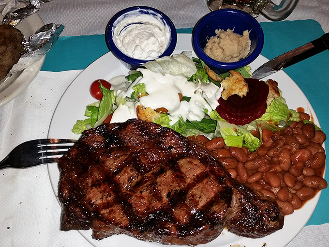 This isn't just a steak; it's a declaration of independence from pretentious dining &ndash; complete with ranch beans that could make a Texan weep with joy.