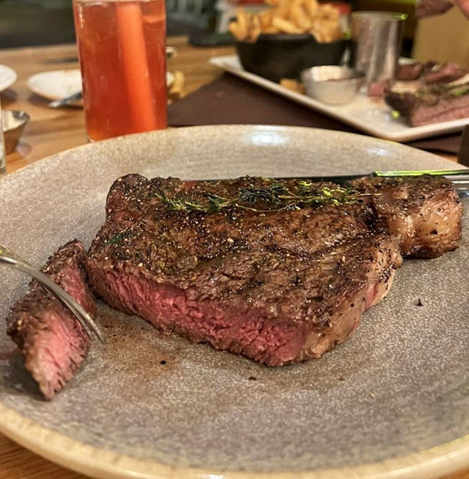 This perfectly seared ribeye isn't just dinner&mdash;it's a masterclass in temperature control, with that rosy interior making carnivores weak at the knees.