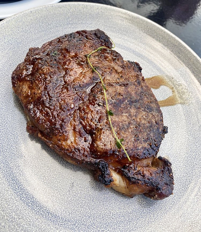 This ribeye didn't just arrive on a plate; it made an entrance worthy of a standing ovation.