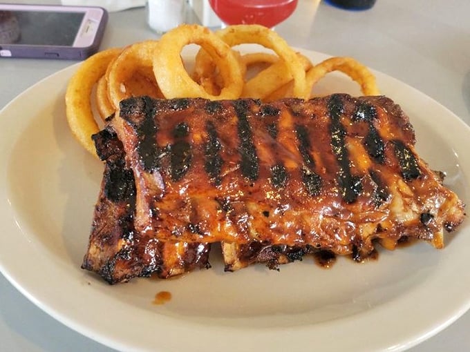 These ribs don't just fall off the bone&mdash;they practically leap into your mouth with perfect grill marks and a glaze that glistens like edible jewelry.