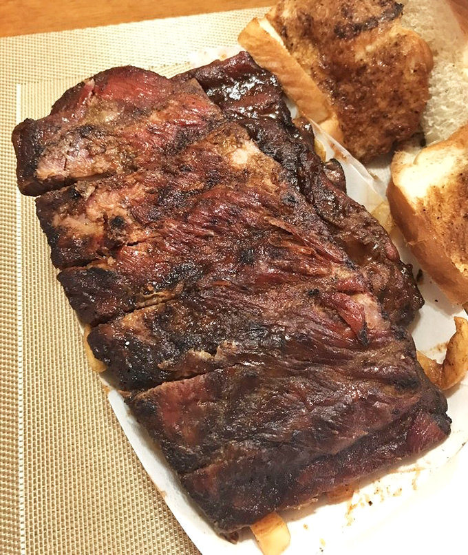 These ribs aren't just smoked, they're transformed&mdash;the bark so perfect you'd think it was carved by a barbecue Michelangelo.