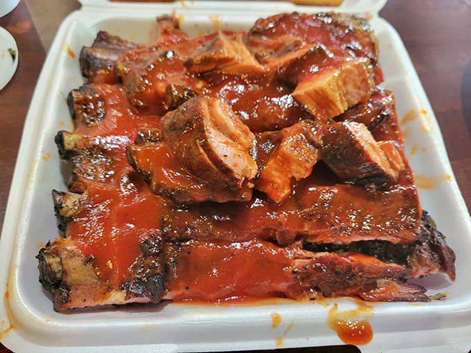 These mahogany-glazed beauties glisten like edible jewelry, each rib a masterpiece of smoke, char, and sticky perfection.