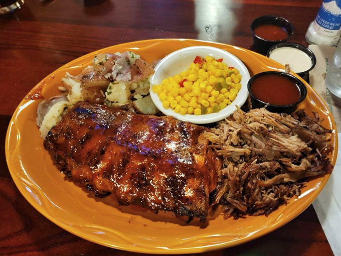 Behold the BBQ trifecta: fall-off-the-bone ribs, tender pulled pork, and sides that don't know they're supposed to be supporting actors.