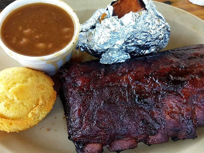 These ribs don't just fall off the bone&mdash;they practically leap into your mouth. That smoke ring isn't just color; it's a badge of barbecue honor.