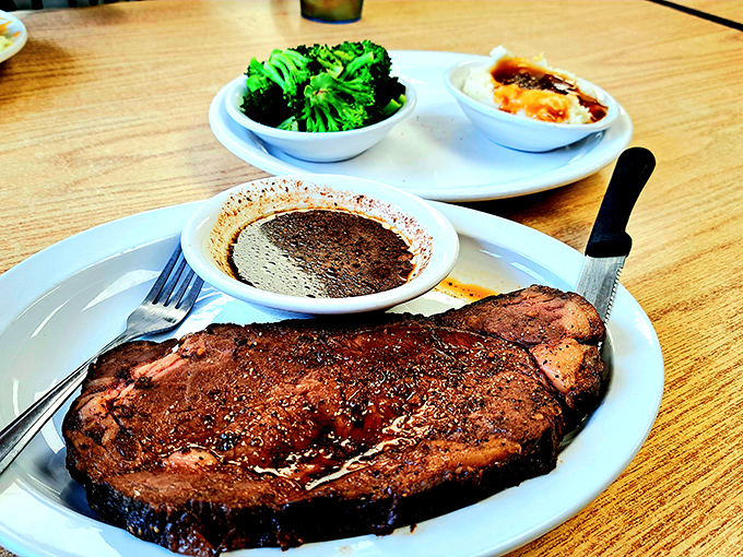 Behold the star of the show: a perfectly seasoned steak that doesn't need fancy garnishes to make its point. This is meat that means business.