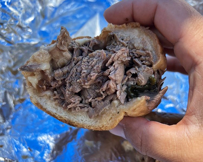 Behold the roast beef in its natural habitat&mdash;tender, perfectly seasoned meat nestled in a roll that's somehow both sturdy and yielding. Poetry in sandwich form.