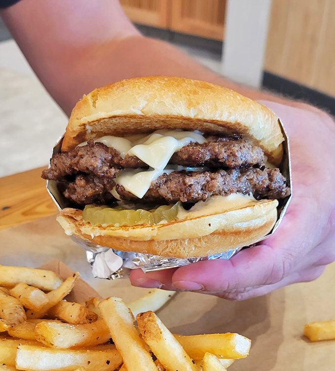 Behold the perfect smash burger&mdash;crispy-edged patties, melty cheese, and a bun that knows its supporting role without stealing the show. 