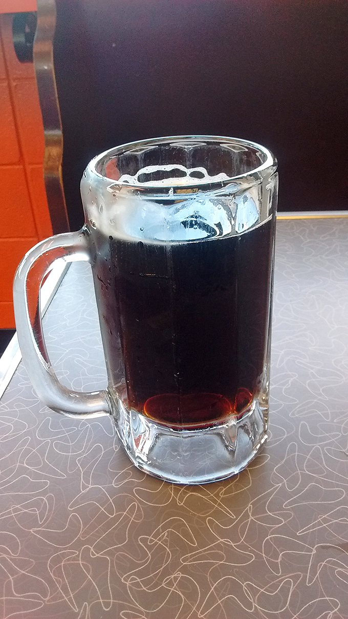 Liquid nostalgia in a frosty mug. Jolly's root beer isn't just a beverage &ndash; it's a time machine that takes you back to simpler days with every sip.