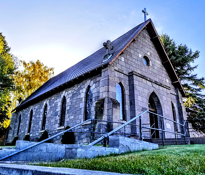 Sacred Heart Catholic Church offers spiritual solace and architectural charm with stone walls that have absorbed decades of prayers and community milestones.