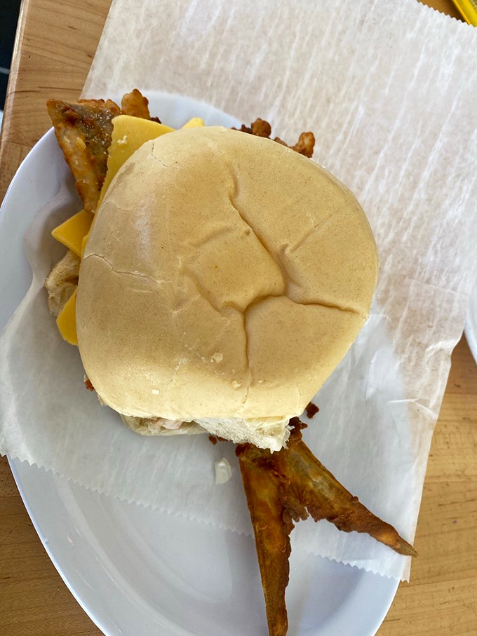 Behold the famous Pan con Minuta &ndash; that fish tail sticking out isn't just showing off, it's proof you're getting the real deal. The seafood equivalent of a designer label.