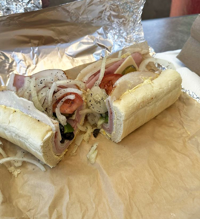 Behold the cross-section of perfection: layers of Italian meats nestled between fresh bread like edible architecture.