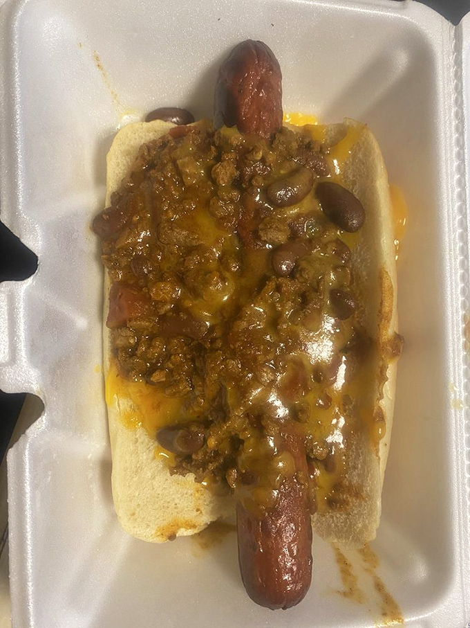 Behold the star attraction: a hot sausage sandwich that doesn't need fancy plating or garnishes to make your taste buds stand at attention.