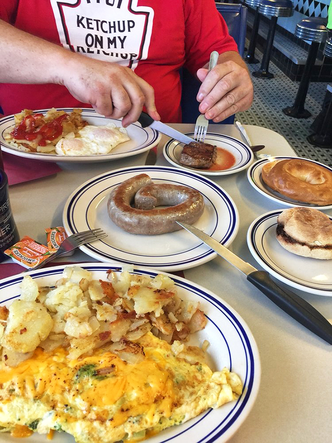 Behold the star attraction&mdash;a perfectly cooked sausage link with that ideal snap, surrounded by a breakfast spread worthy of royalty.