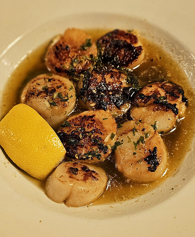 These seared scallops aren't just cooked&mdash;they're transformed into buttery ocean treasures swimming in a sauce you'll want to bottle and take home.