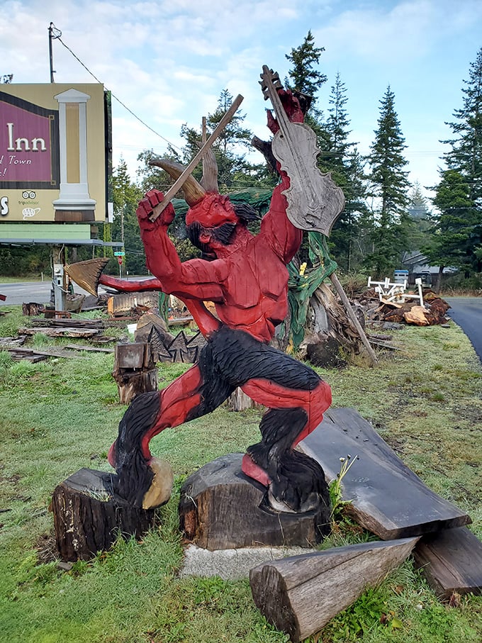 The devil went down to Oregon? This crimson musician looks ready to challenge visitors to a fiddle-playing duel.