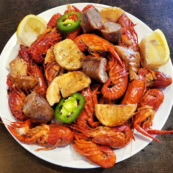 A plate that would make Neptune jealous&mdash;crawfish, sausage, and potatoes mingling like old friends at a spicy underwater party.