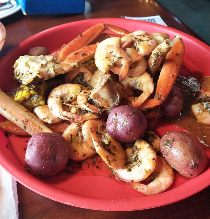 A seafood boil that doesn't mess around &ndash; crab legs, shrimp, potatoes, and corn, all seasoned to perfection. This isn't a meal; it's a maritime celebration.