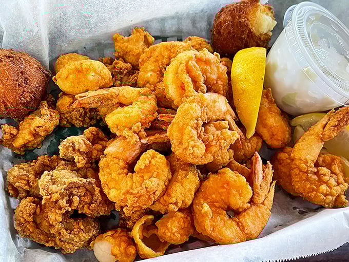 Golden-fried perfection that makes you question every other seafood you've eaten. These shrimp didn't travel far to reach seafood nirvana.