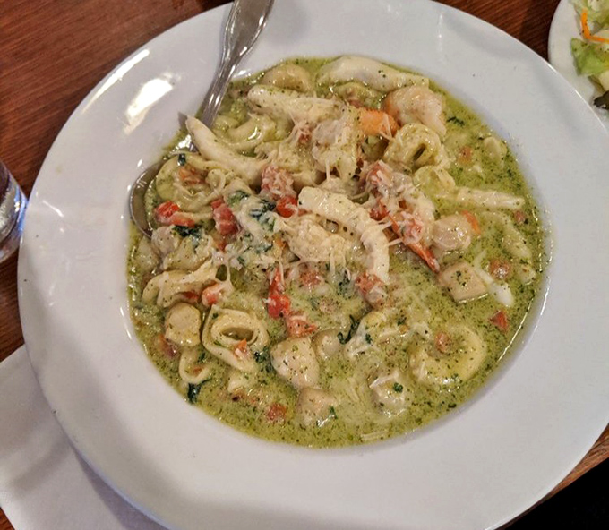 That pesto seafood tortellini is swimming in enough garlic butter to make vampires relocate to Nevada.