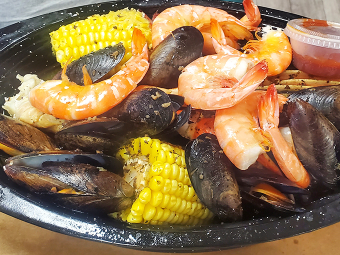 A steaming pot of oceanic treasures&mdash;where plump shrimp, sweet corn, and briny mussels commingle in a seasoned broth that could make Neptune himself weep with joy.