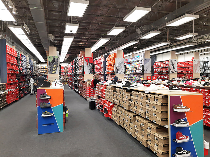 Sneaker heaven or organized chaos? Either way, this shoe selection would make Imelda Marcos need a moment to collect herself.